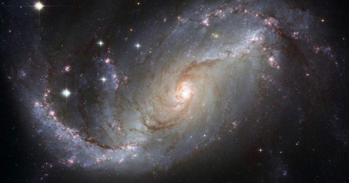 Astronomers spotted ancient unlensed barred spiral galaxy in early ...
